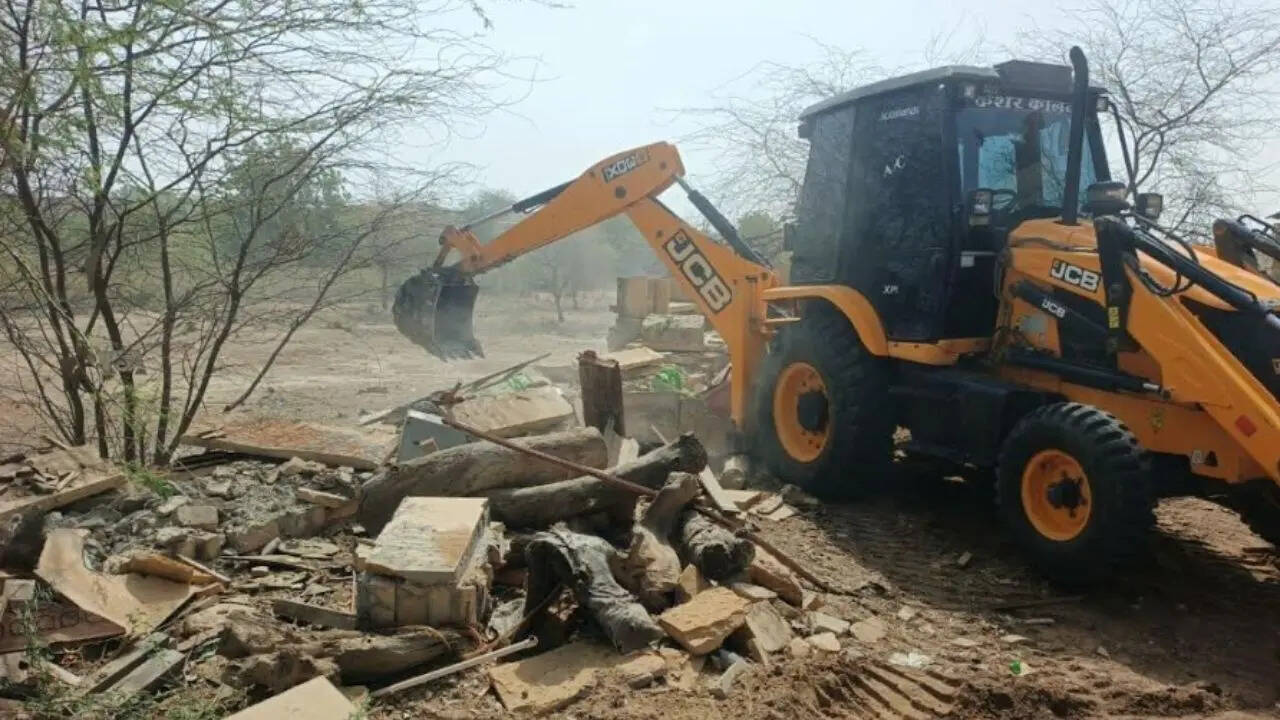 Major UIT crackdown: 300 bighas of encroached land cleared, property ...