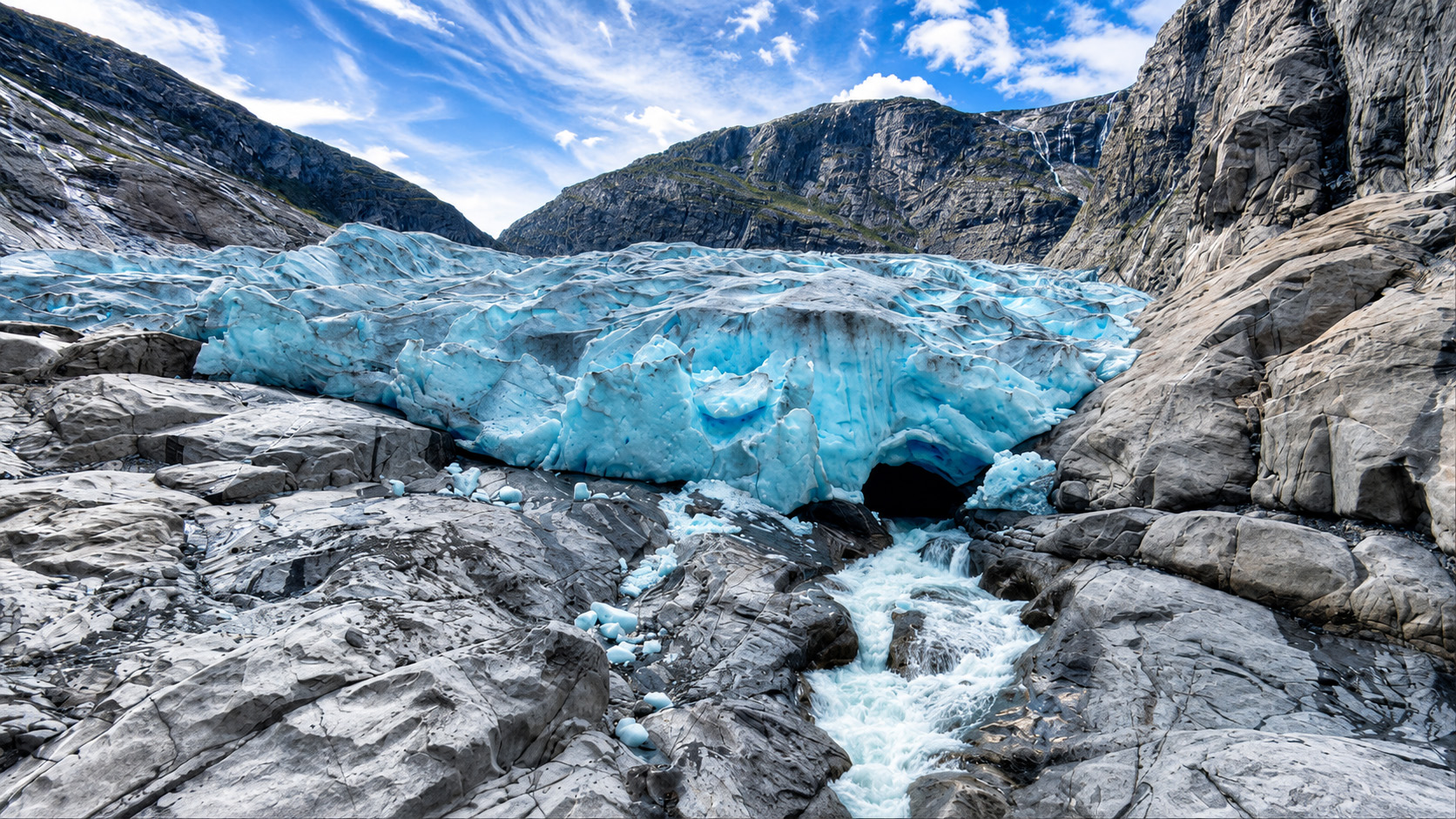 A glacier cave formed above a fast-melting ice river