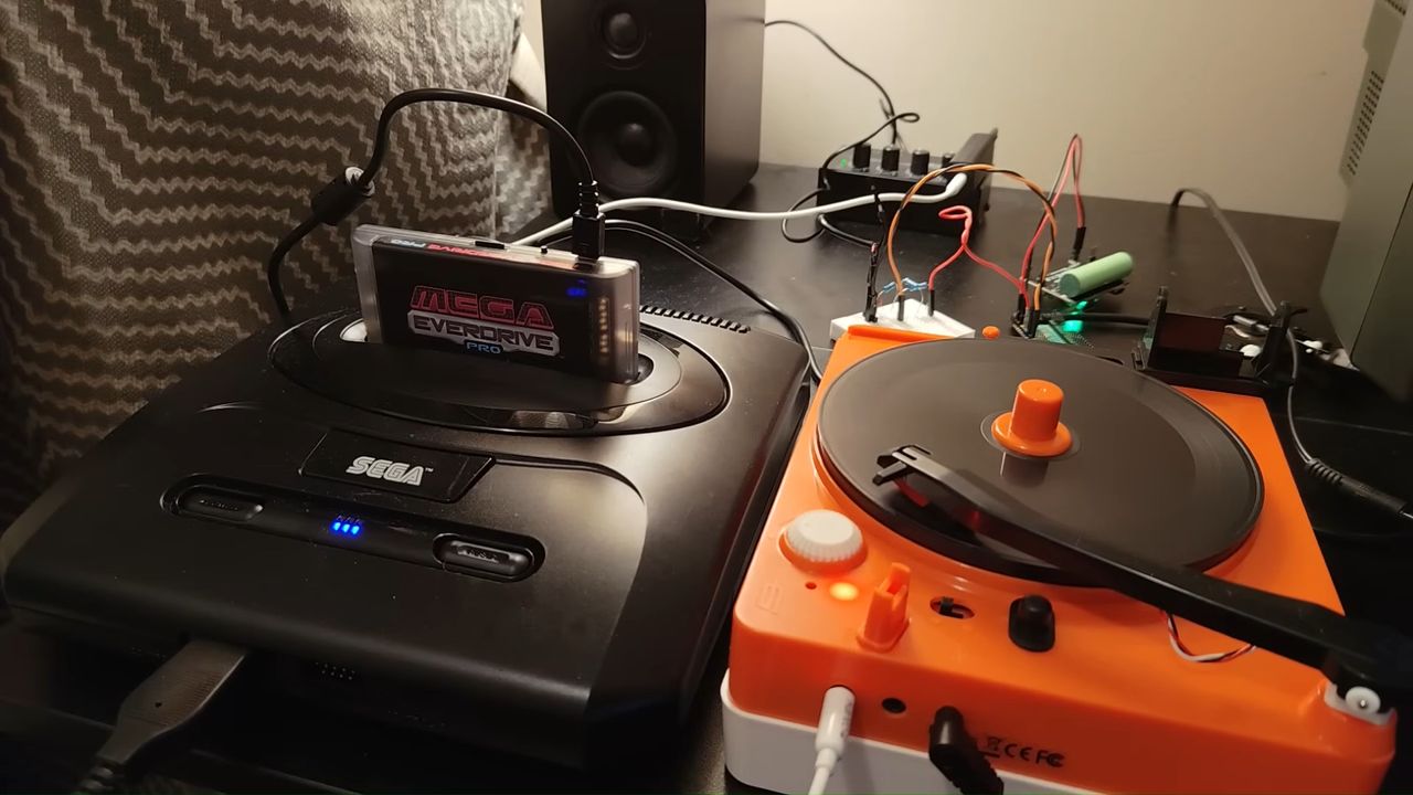 Retro gaming enthusiast attempts loading games to Sega Genesis from a ...