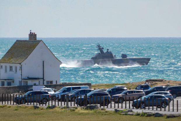 'I don’t think we’ve ever seen anything pass by so fast' Navy boat's ...
