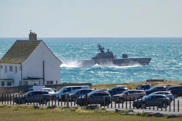 'I don’t think we’ve ever seen anything pass by so fast' Navy boat's ...