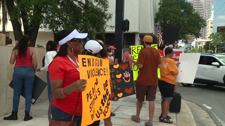 Tampa advocates call for change on gun violence during Wear Orange Weekend