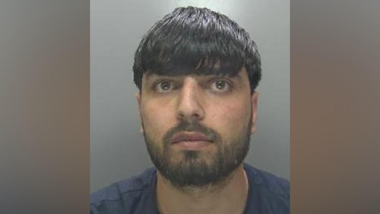 Driver hit police car leaving officers injured