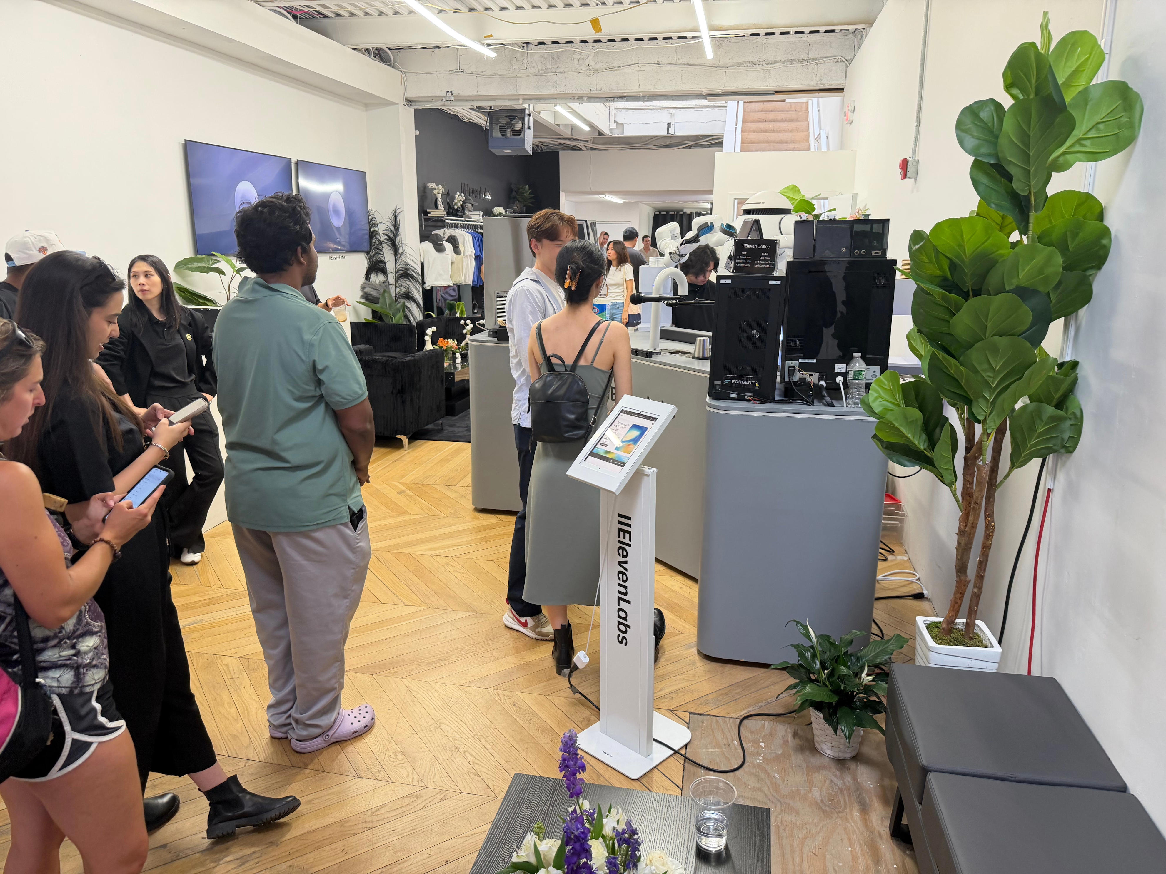 I went to ElevenLabs' NYC pop-up. A robot poured me cold brew before I ...