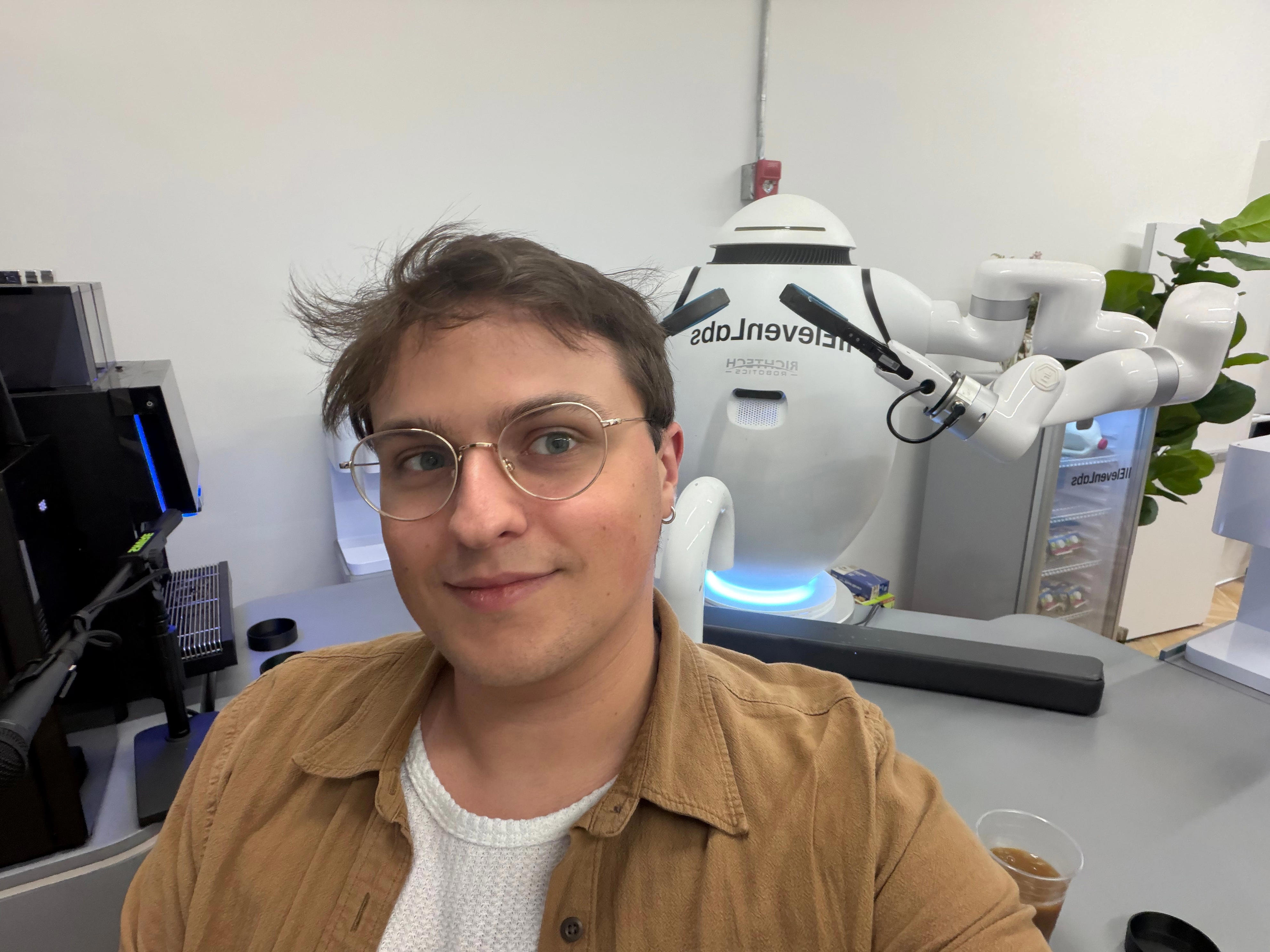I went to ElevenLabs' NYC pop-up. A robot poured me cold brew before I ...