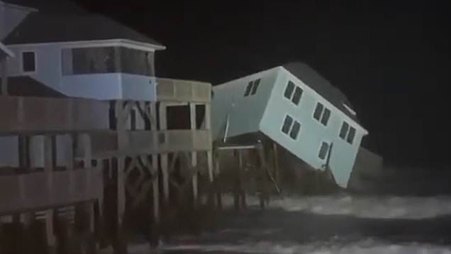 Waves claim beachfront home and drag it into the sea