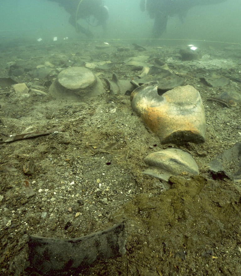 Divers pulled a tiny figurine from an Italian lake after 3,000 years ...