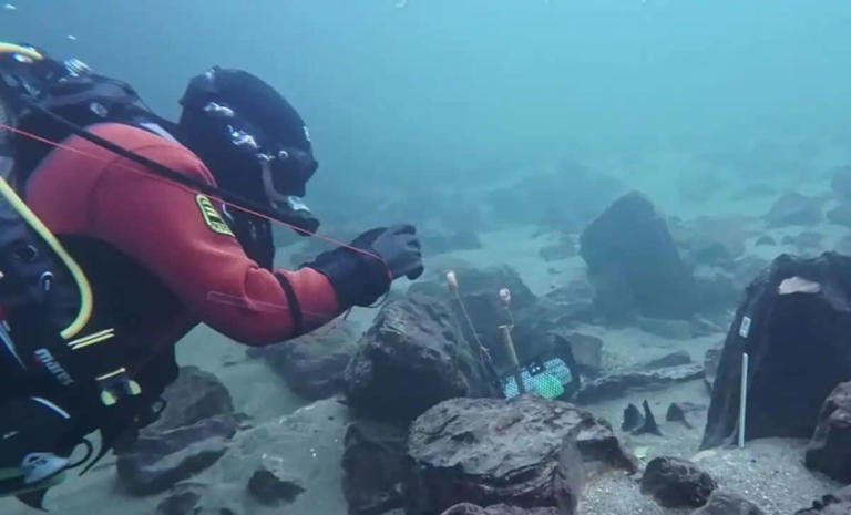 For 1,700 years this river hid a Roman secret. Divers just found it