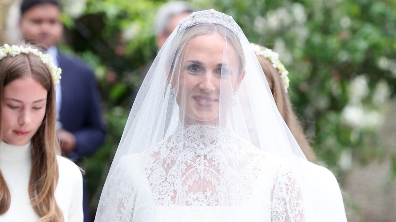 Harriet Sperling is the epitome of a royal bride in white lace and a ...