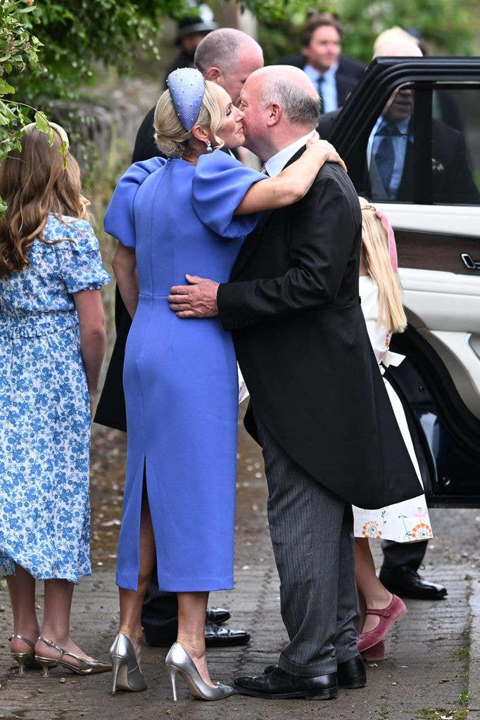 Zara Tindall wows in 'something blue' at brother Peter Phillips' wedding