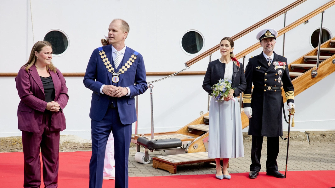 Queen Mary’s scarf and rose hairstyles spark fashion buzz