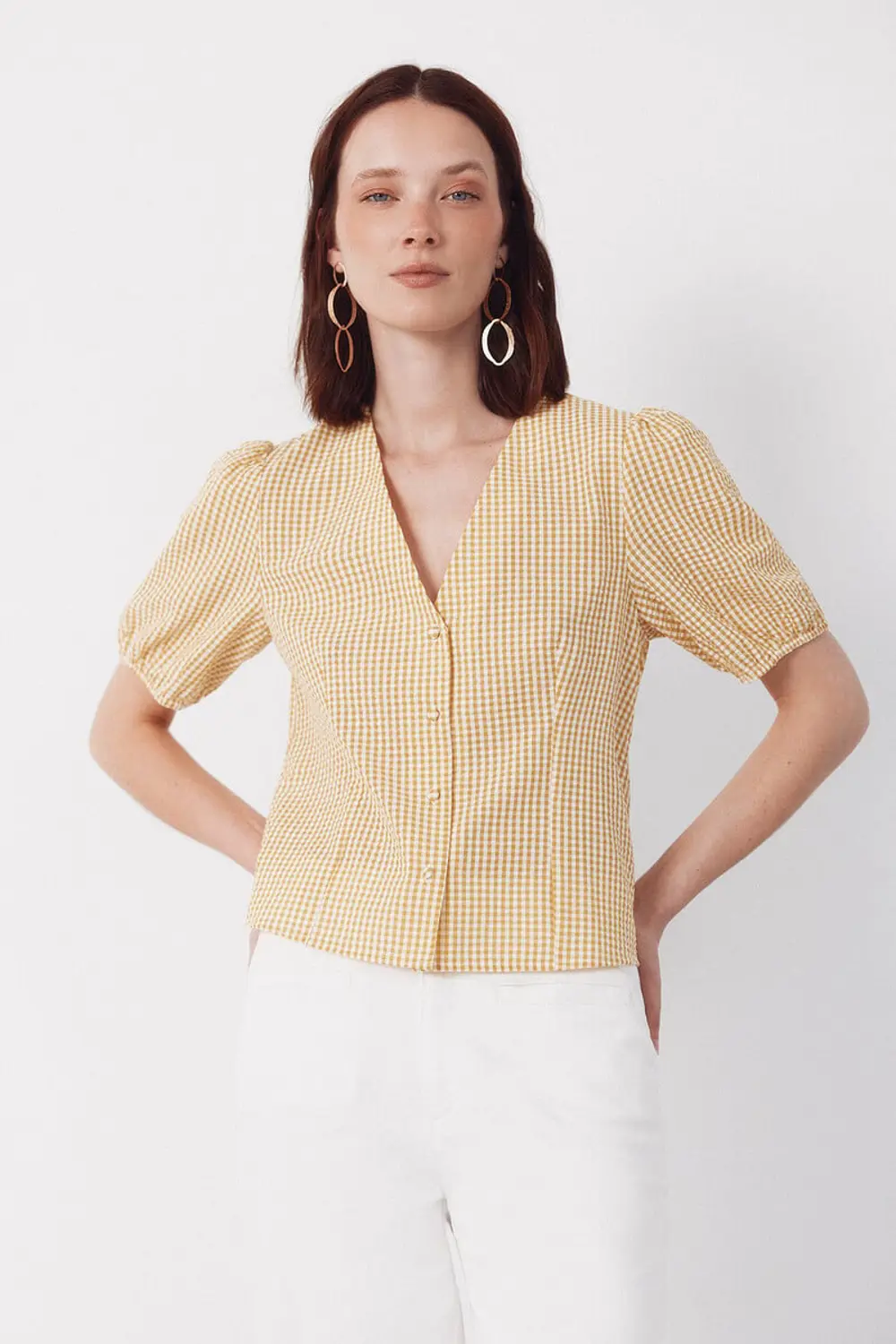 5 blusas de Cortefiel para llevar con pantalones anchos