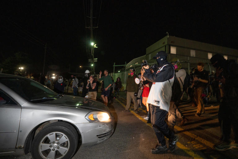 Clashes erupt outside Newark's Delaney Hall, photographer hit by car