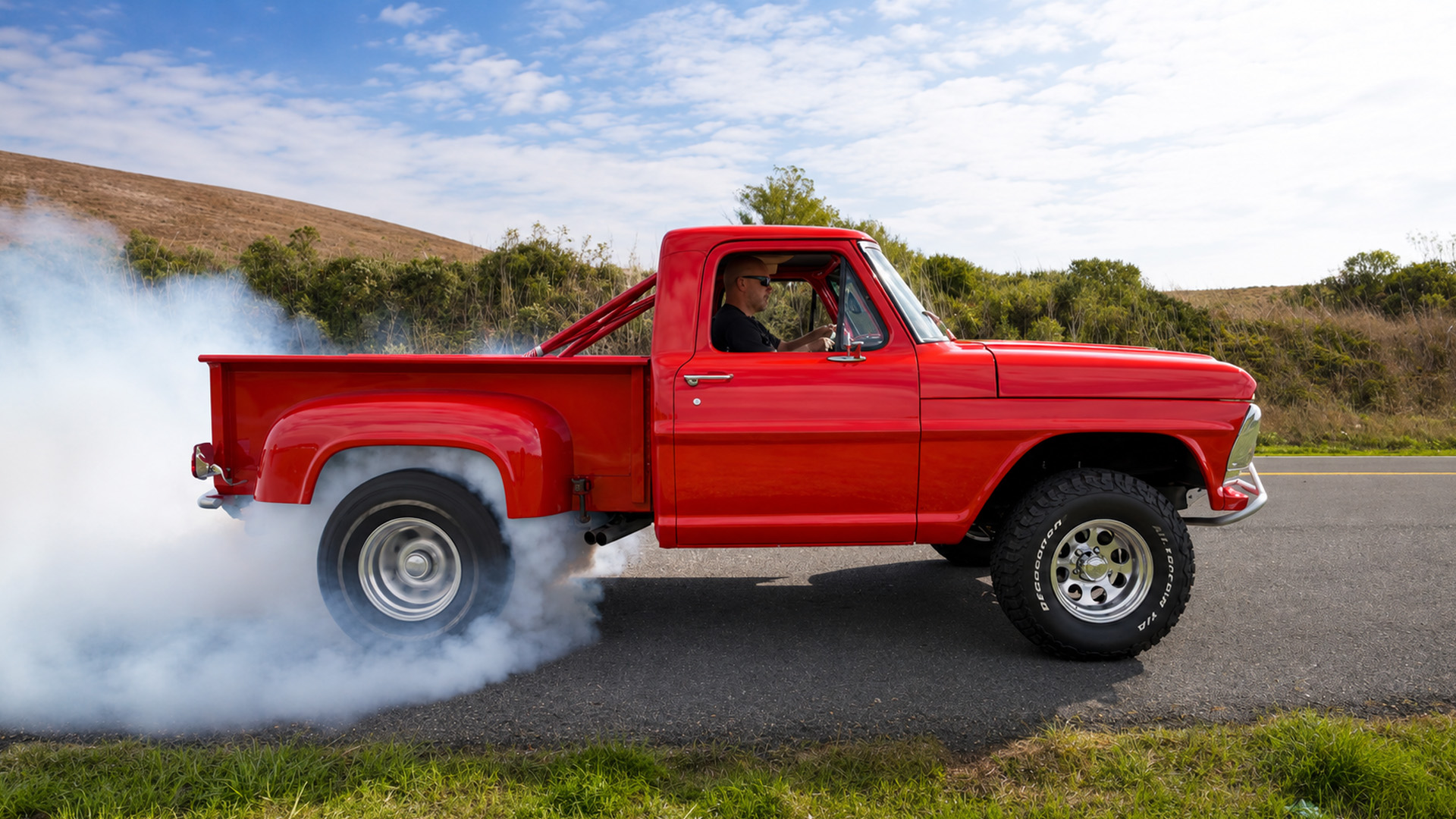 Classic Ford F-100 truck brutal burnout on open road
