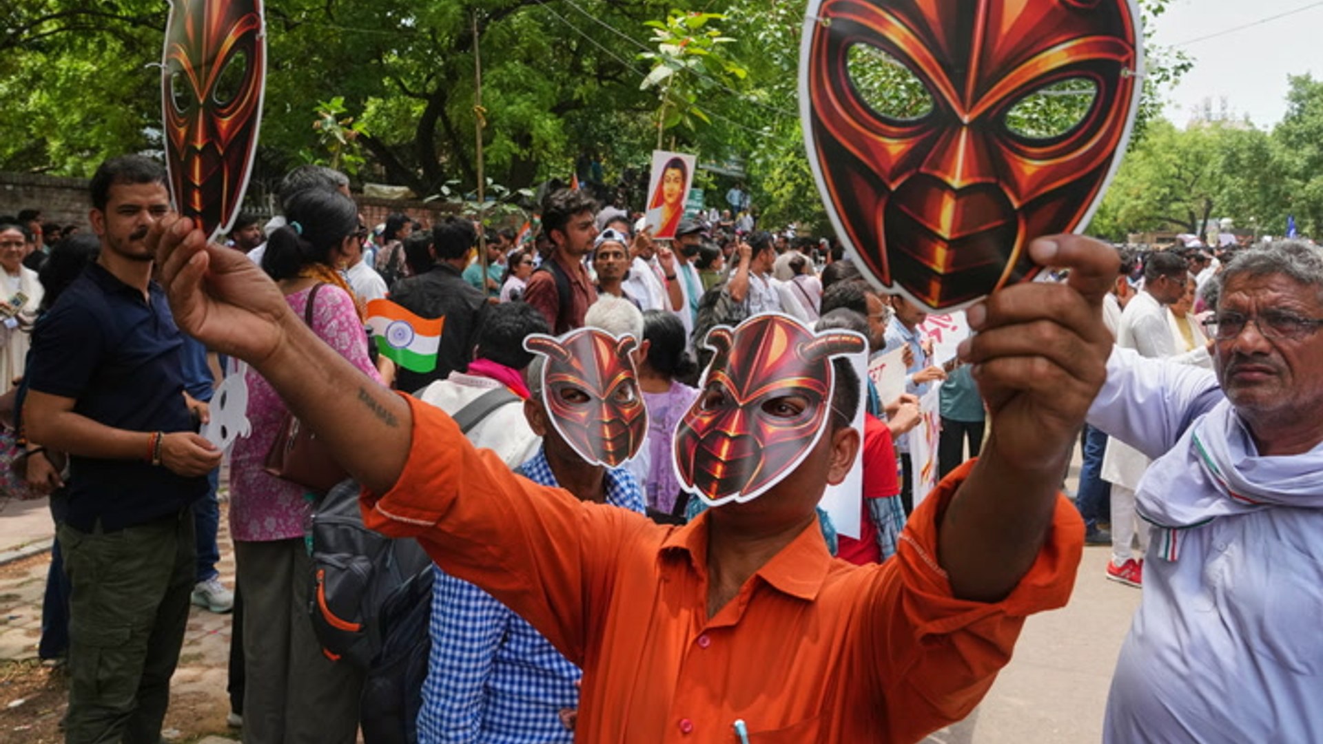 Hundreds don masks as supporters of India’s viral 'Cockroach People’s ...