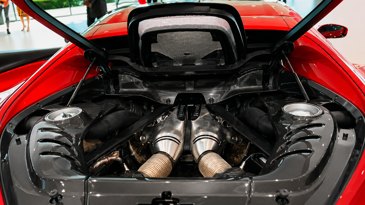 The revolutionary wide V6 engine compartment of a modern Ferrari 296 GTB