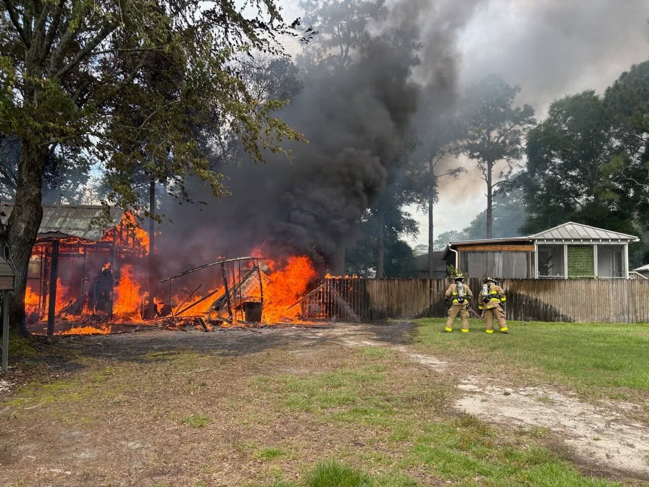 Firefighters battle structure fire in northwest Florida