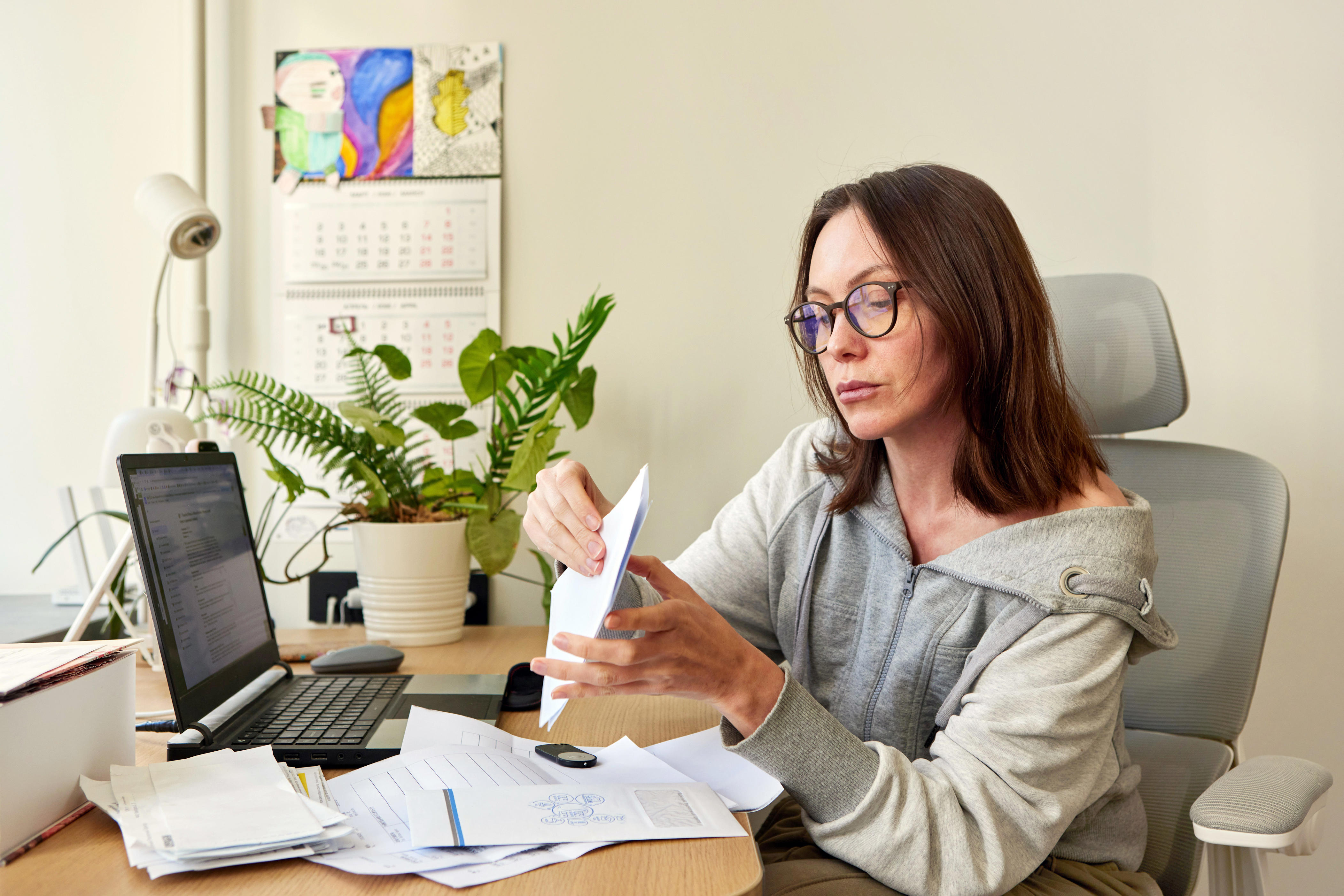 Professional organizers say these 10 paper items are just taking up space