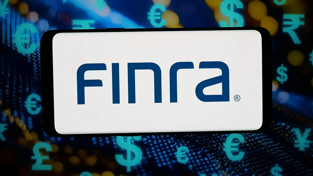 FINRA scraps $25K day trading rule, boosting broker stocks
