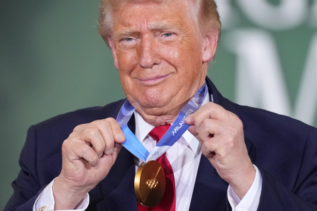Trump jokes with Olympic speed skater after wearing his gold medal