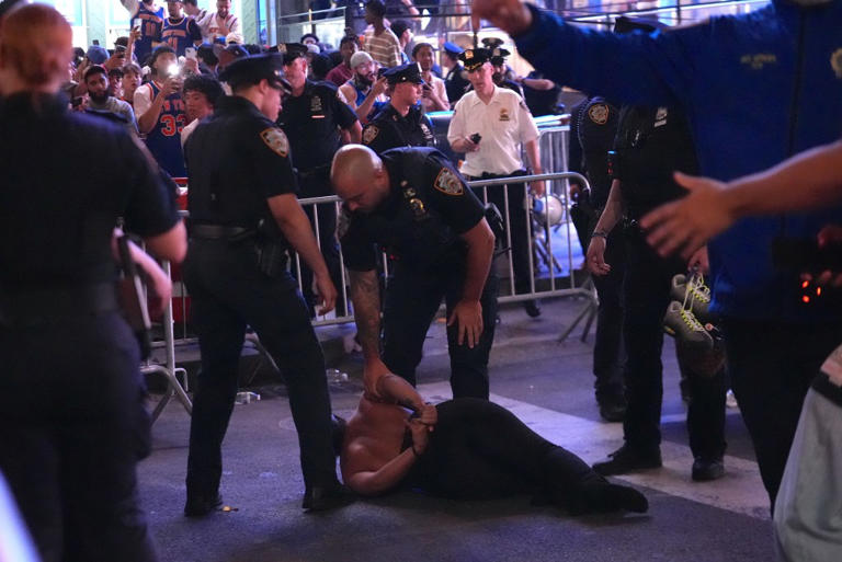 Flagrant foul! Female brute punches one cop at Knicks watch party ...