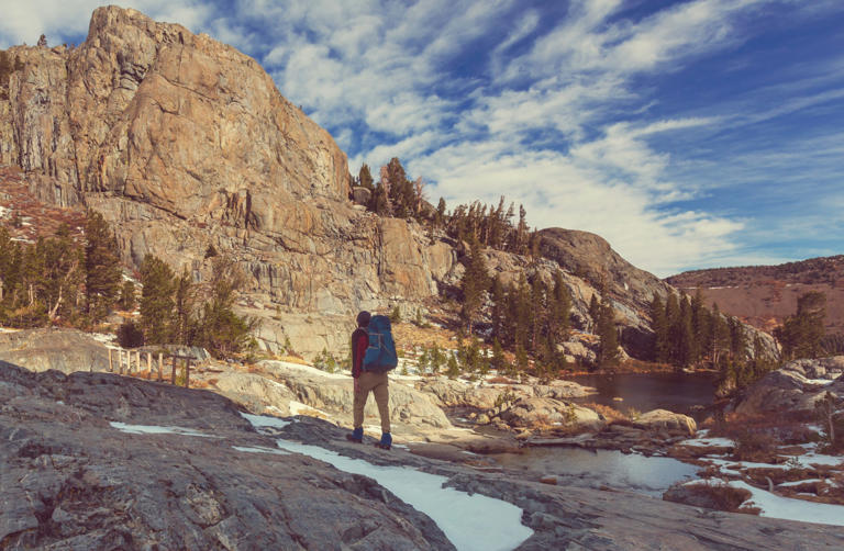 Where carrying a firearm on a hiking trail can be restricted