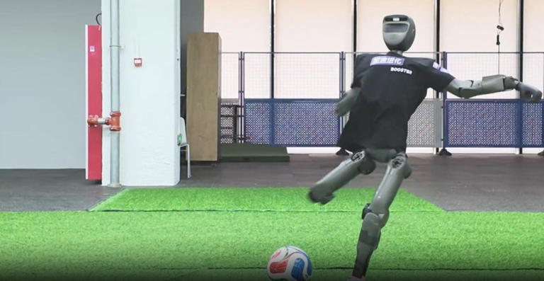Robot soccer player that will likely render humans obsolete kicks ball ...
