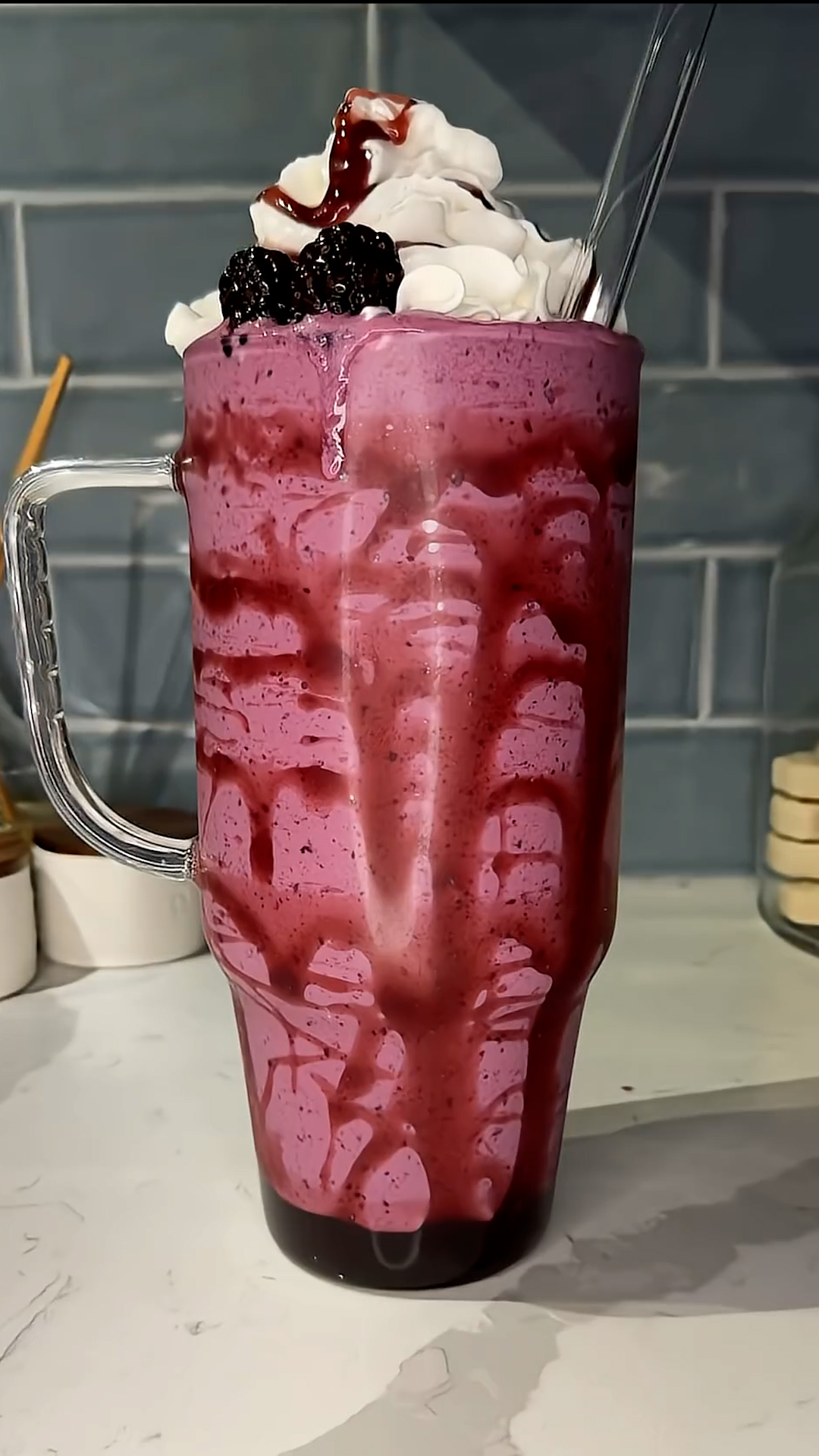 Fresh blackberries blended into a thick purple summer milkshake