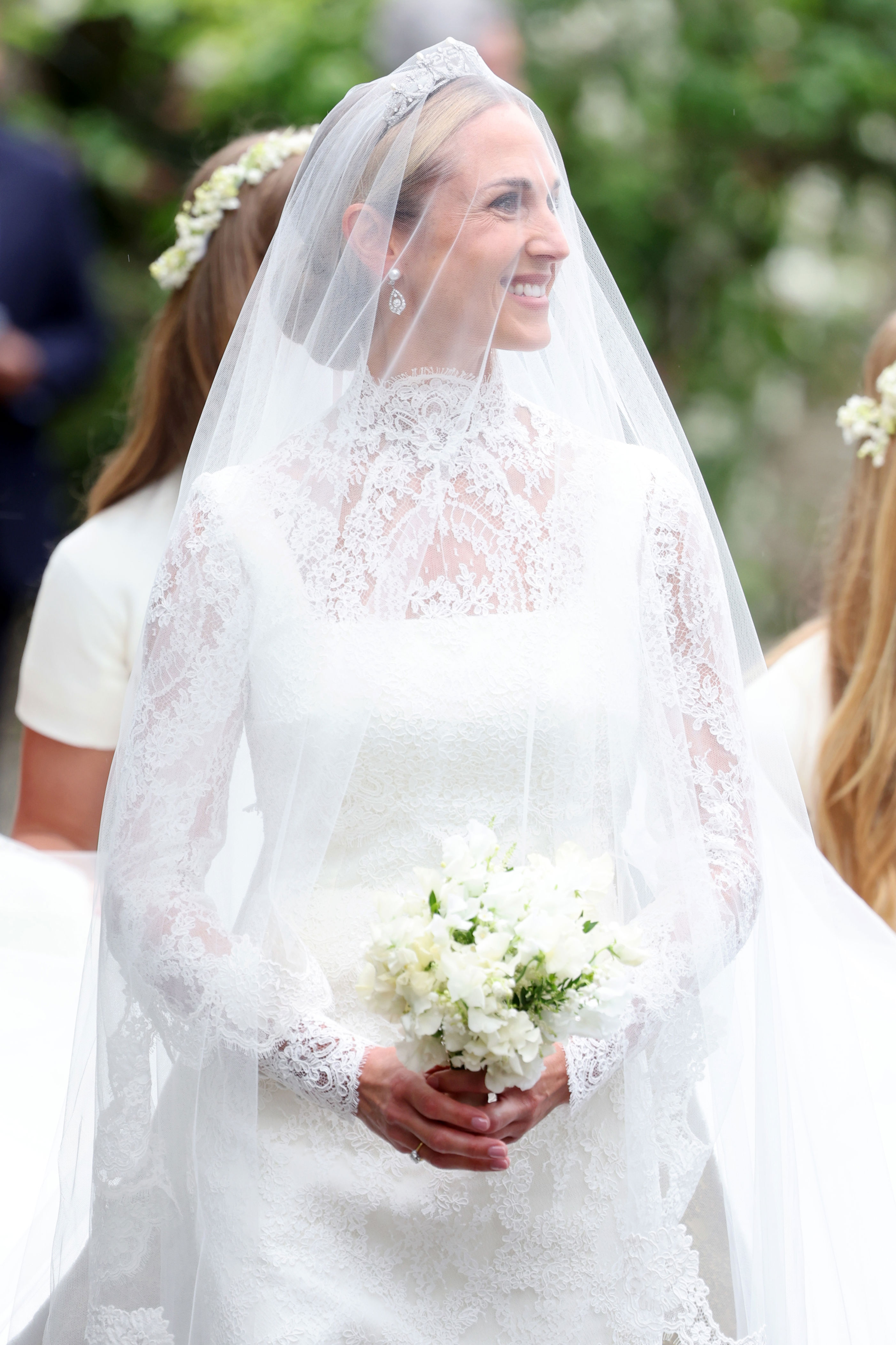 Harriet Sperling is the epitome of a royal bride in white lace and a ...