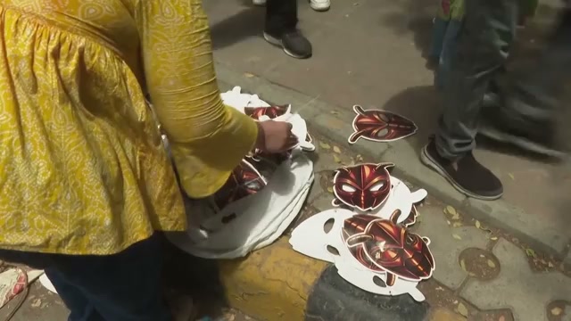 Hundreds don cockroach masks as mock party stages protest in India