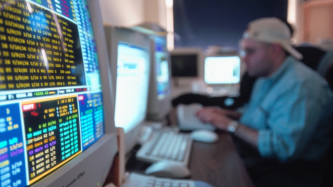 FINRA scraps $25K day trading rule, boosting broker stocks