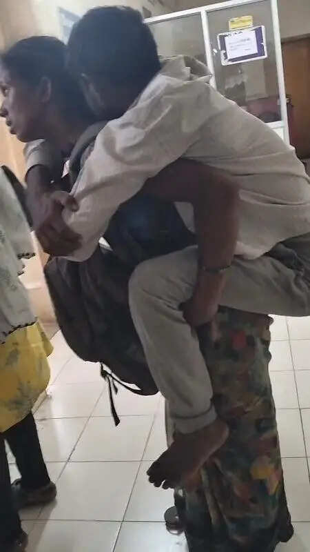 Viral clip of woman carrying sick husband at Akola hosp sparks row
