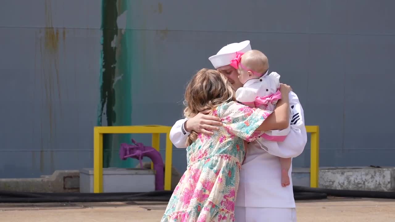 Families reunite with USS Iwo Jima sailors at Naval Station Norfolk ...
