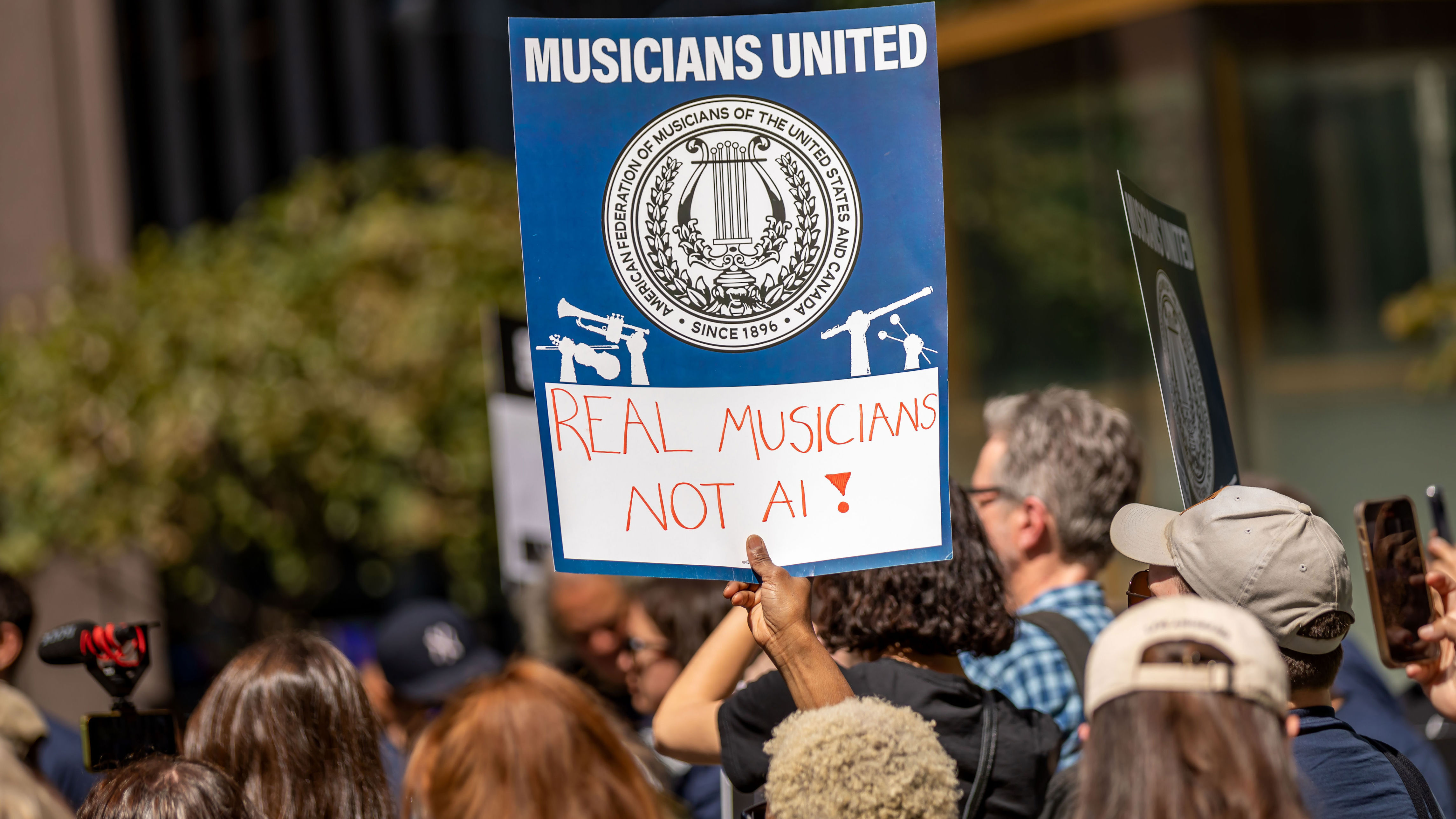 Musicians Union sues Warner and Universal over AI training deals