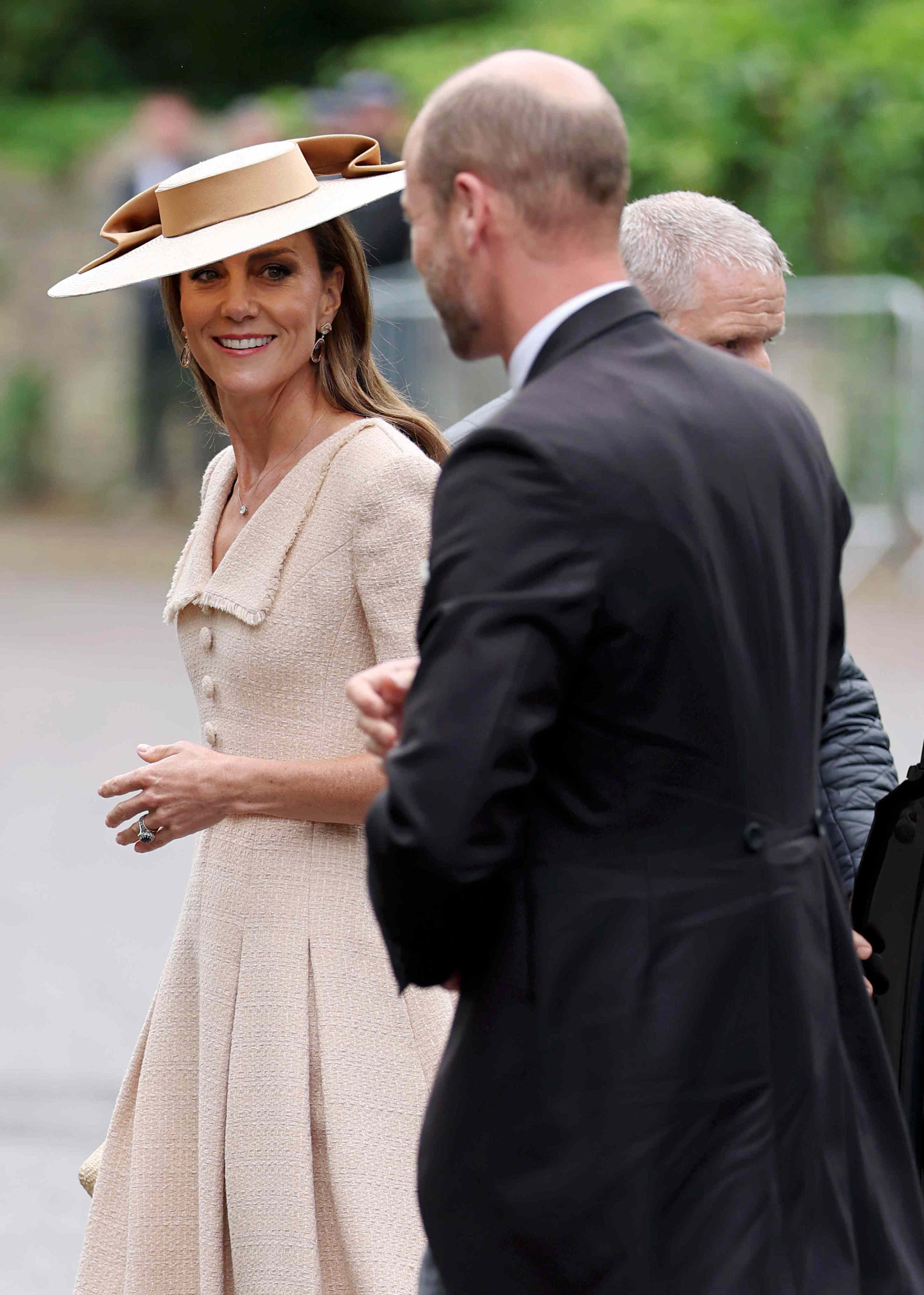 Kate Middleton is radiant in blush tweed at the royal wedding of the ...