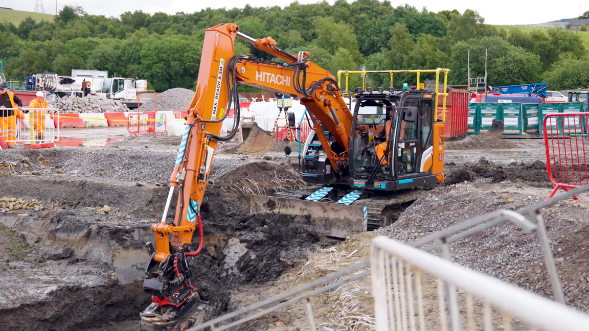 This giant excavator digs through deep mud with ease