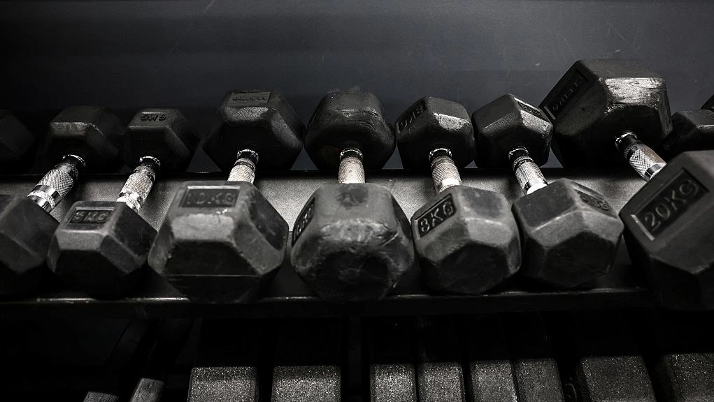 Mastering dumbbell and kettlebell training for life
