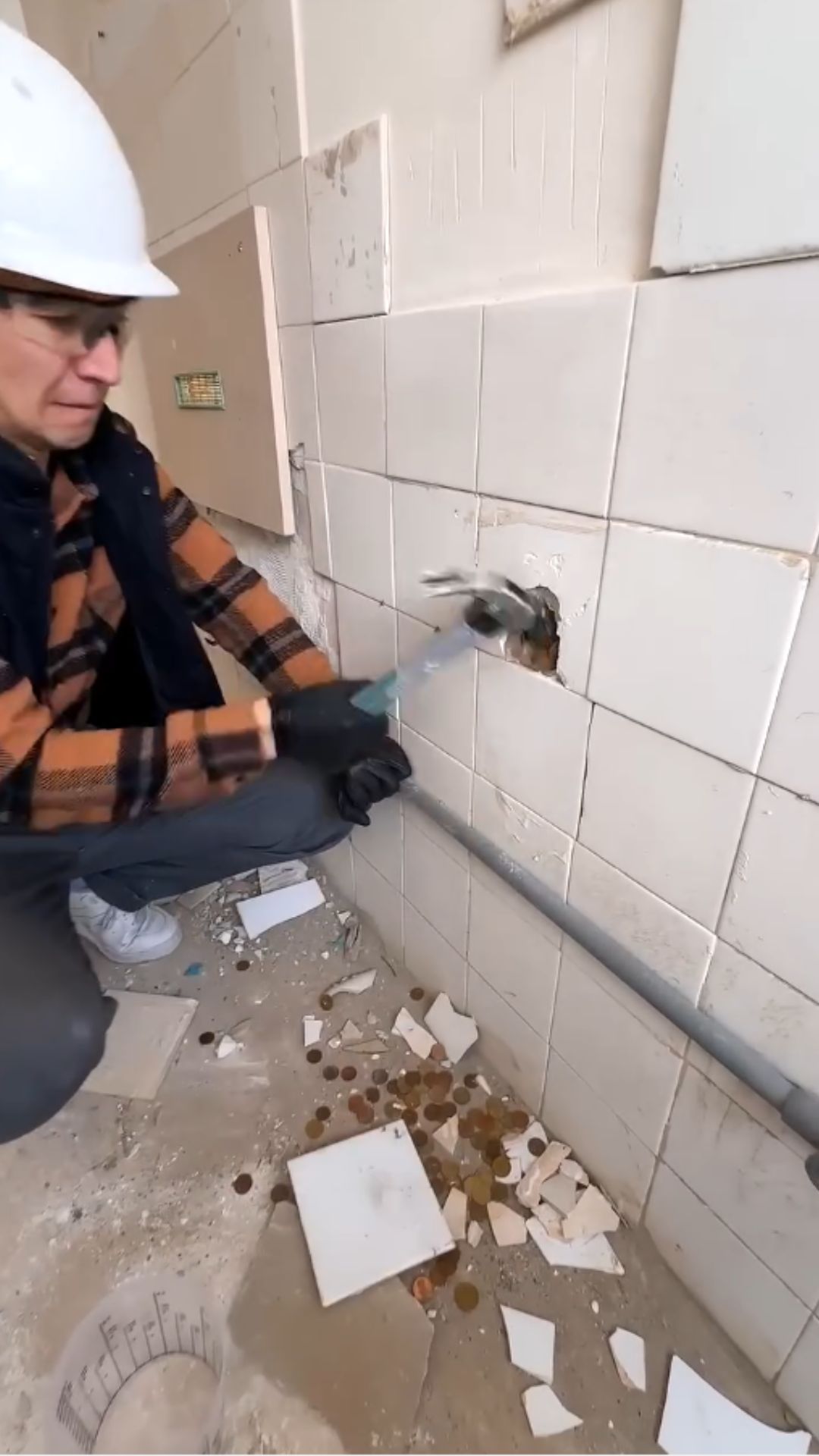 Insane find: Secret stash hidden behind a bathroom wall