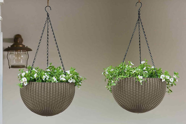 These weatherproof resin rattan hanging baskets look chic on your porch ...