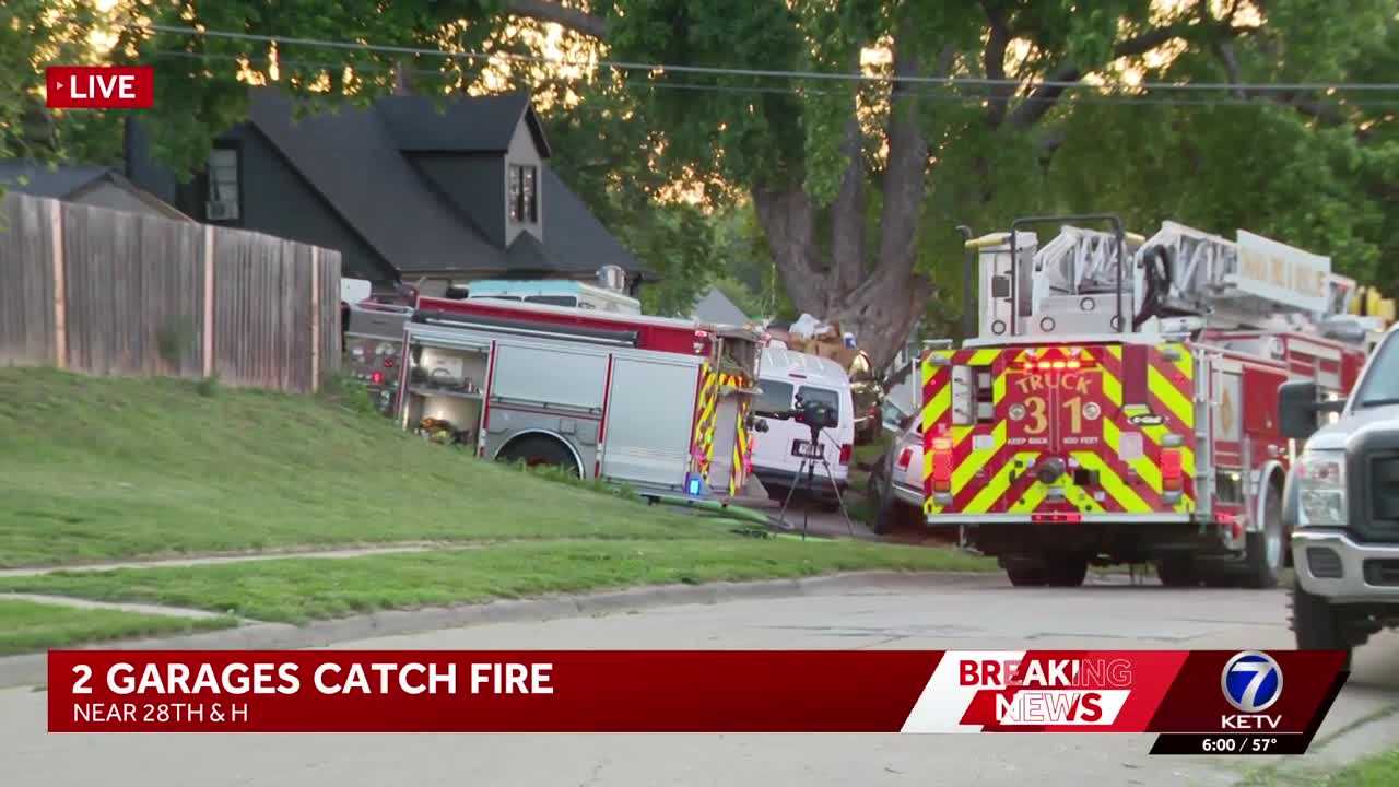 Crews battle large two-garage fire in South Omaha early Wednesday