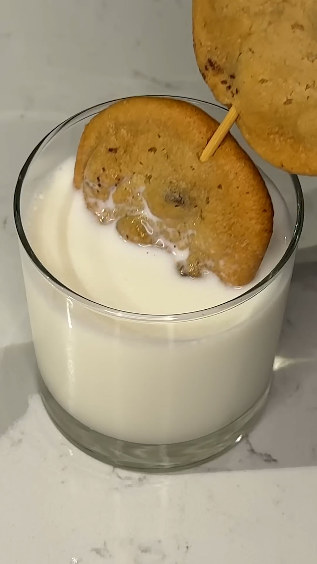 Bite-sized cookies stacked vertically on skewer sticks