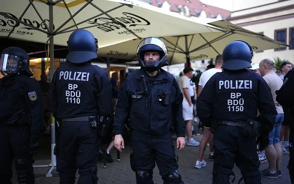 Police detain over 300 after Leipzig fan violence