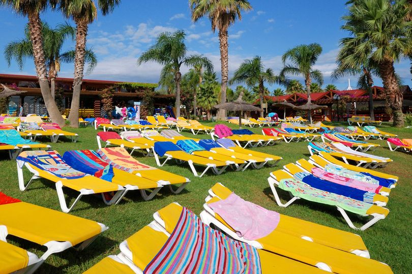 Tourist in Spain glances from balcony and 'war' erupts over sunbeds
