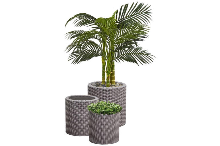 These weatherproof resin rattan hanging baskets look chic on your porch ...