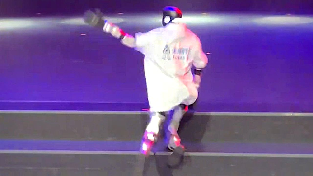 Dancing robot pulls off moonwalk, then takes an unscripted tumble down ...