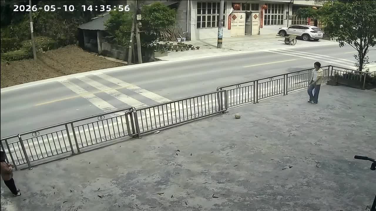 Boy accidentally kicks ball into road, landing perfectly on passing ...