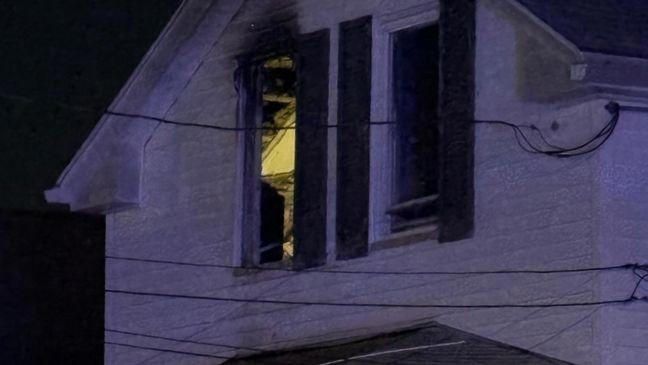 Crews respond to a house fire on Roland Avenue in Cranston