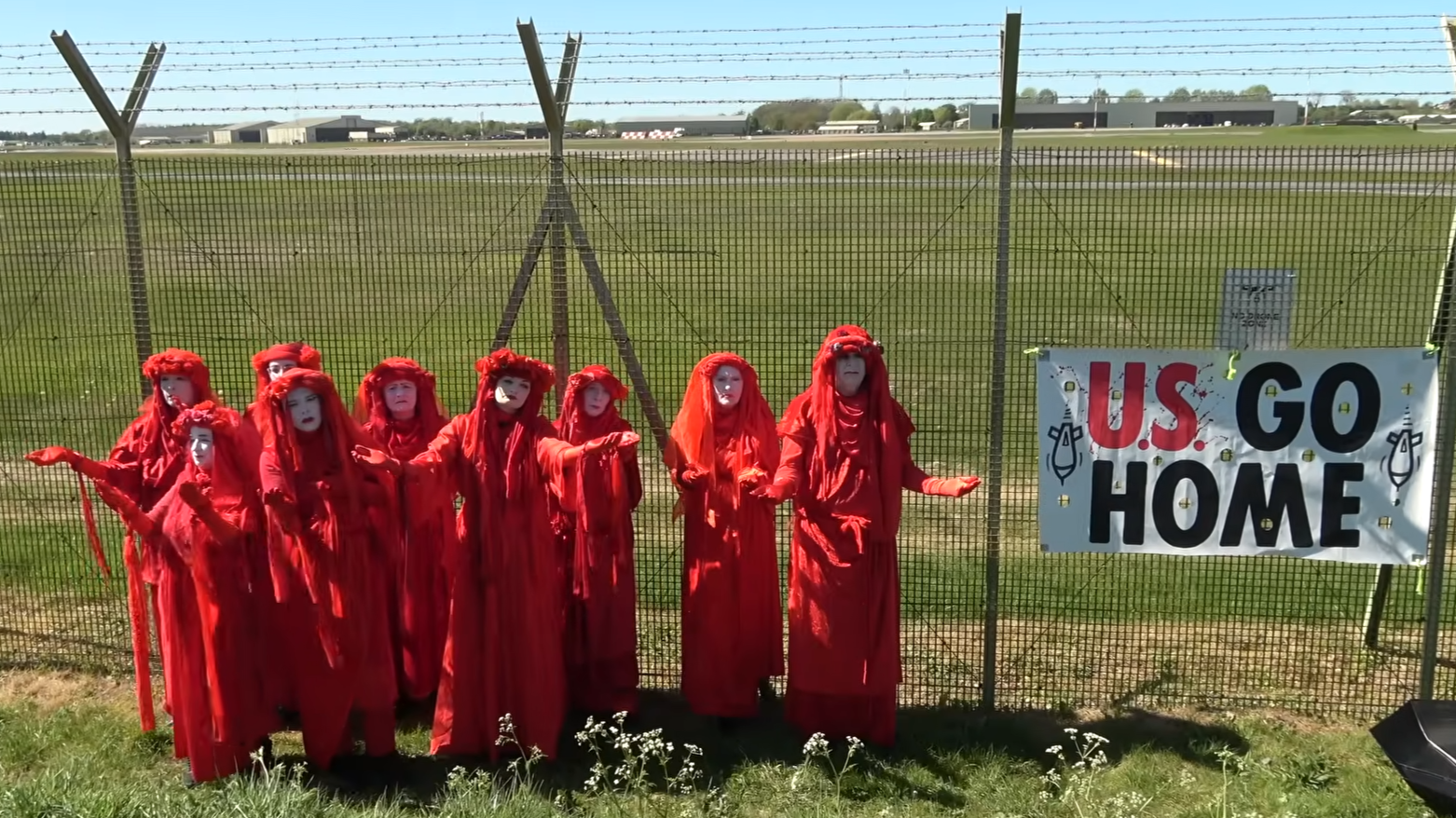 Watch protesters face the B-1 bomber - then the Bone roars overhead