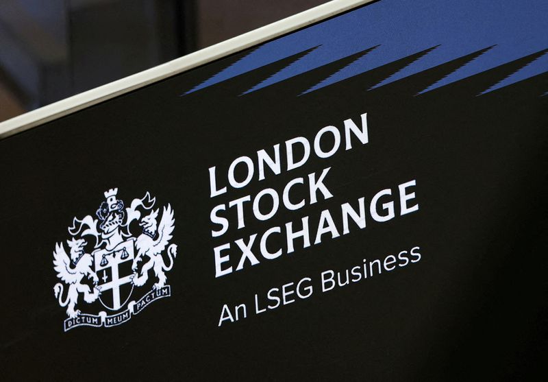 UK shares extend rally as oil slides; corporate gains lift midcaps