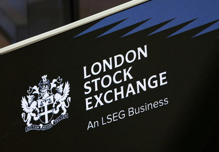UK shares extend rally as oil slides; corporate gains lift midcaps